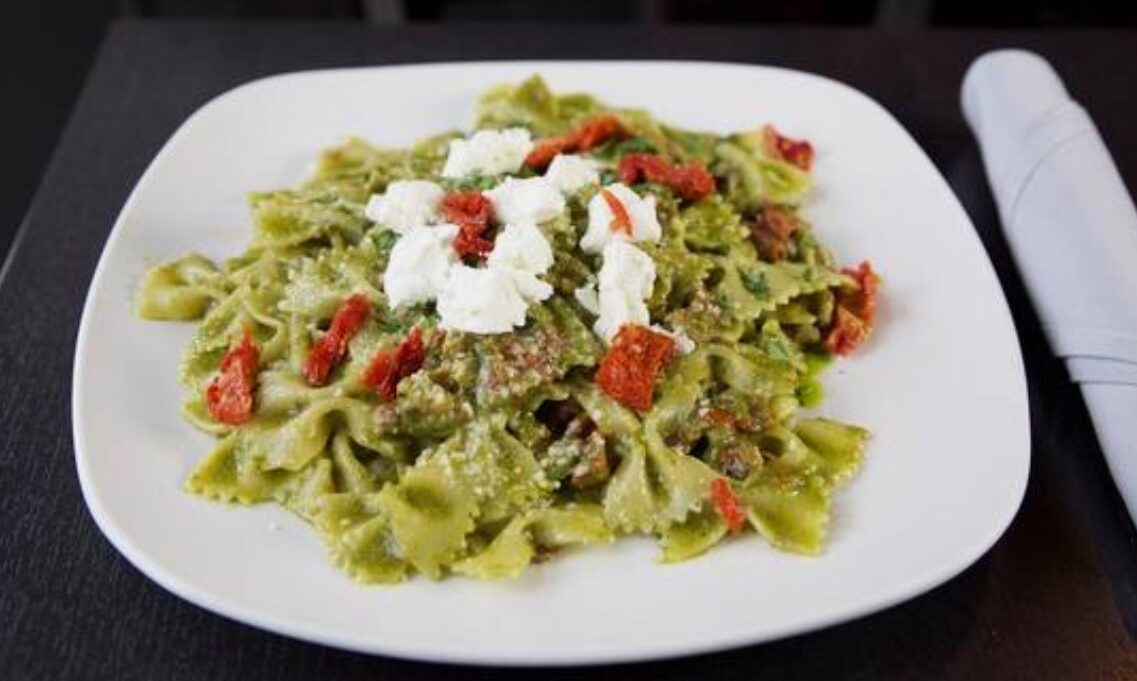 Signature dishes: Carnitas at Qué Onda, roasted Lake Superior whitefish ...